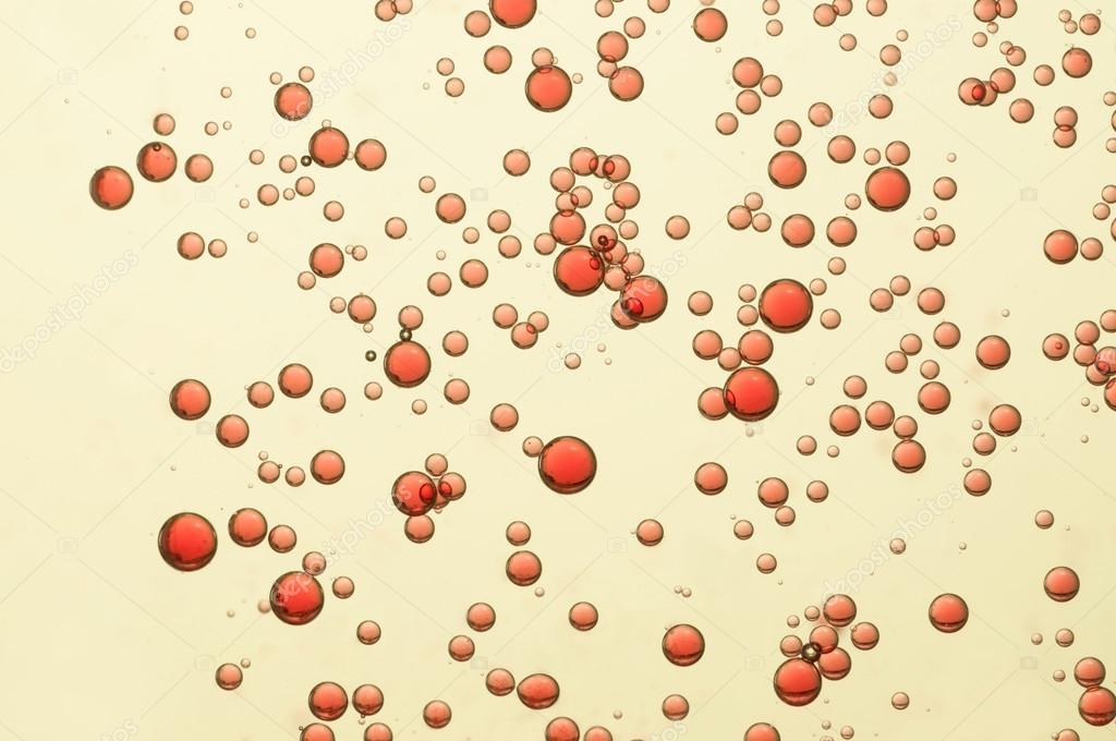 Red carbonated bubbles — Stock Photo © dkidpix #107998044