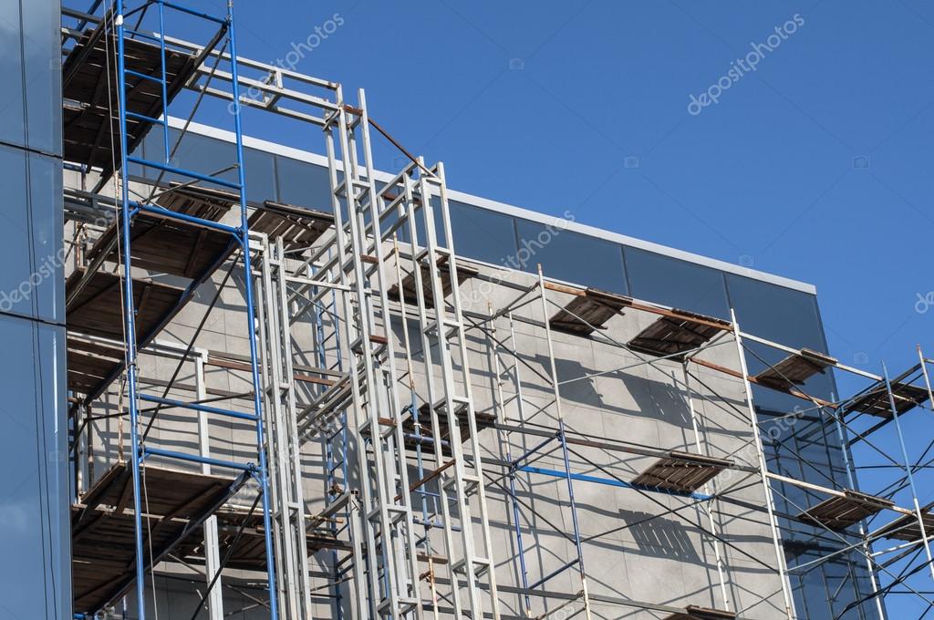 Scaffolding on a building wall Stock Photo by ©uhfybn 88587240