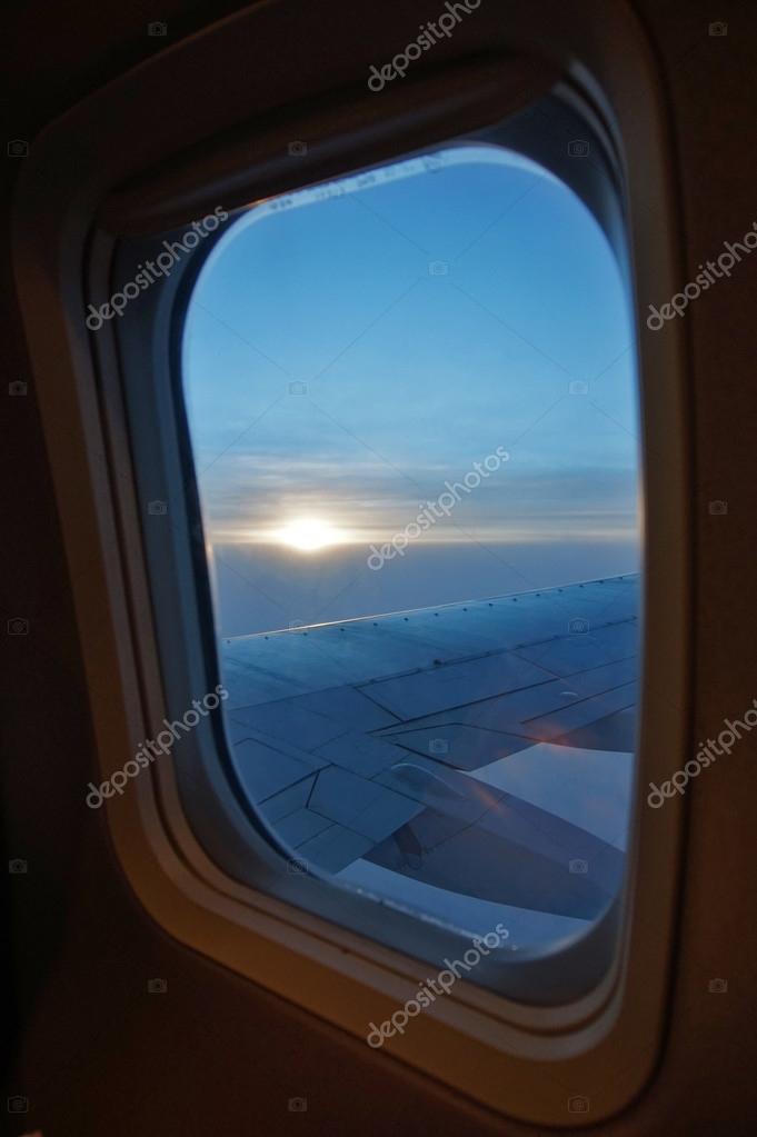 Airplane windows from inside,sunset, sunrise, sun — Stock Photo ...