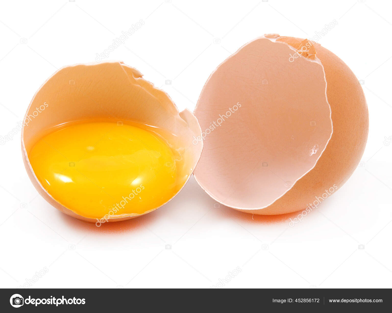 Broken Egg White Background Stock Photo by ©S_Castle 452856172