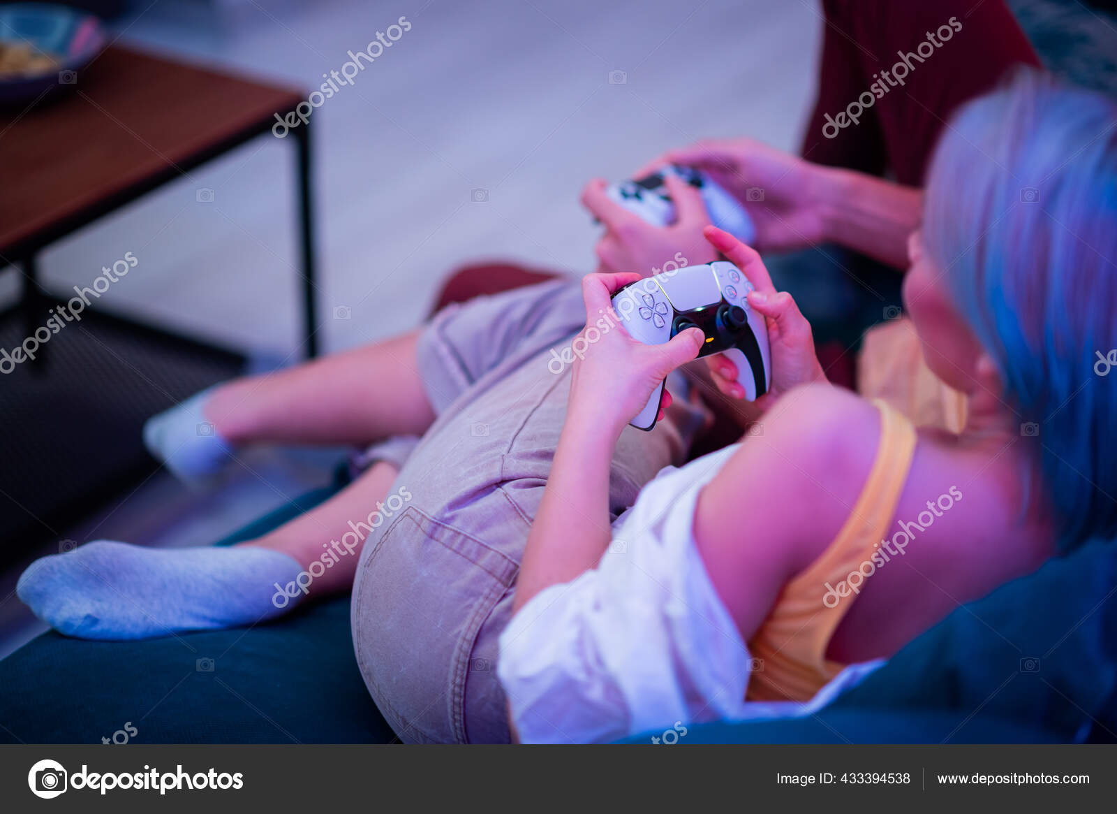 Different generations of PlayStation console controllers: PS5 DualSense ...