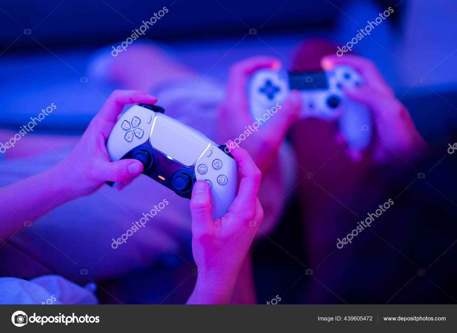Girl using new Sony Playstation 5 DualSense wireless controller which ...