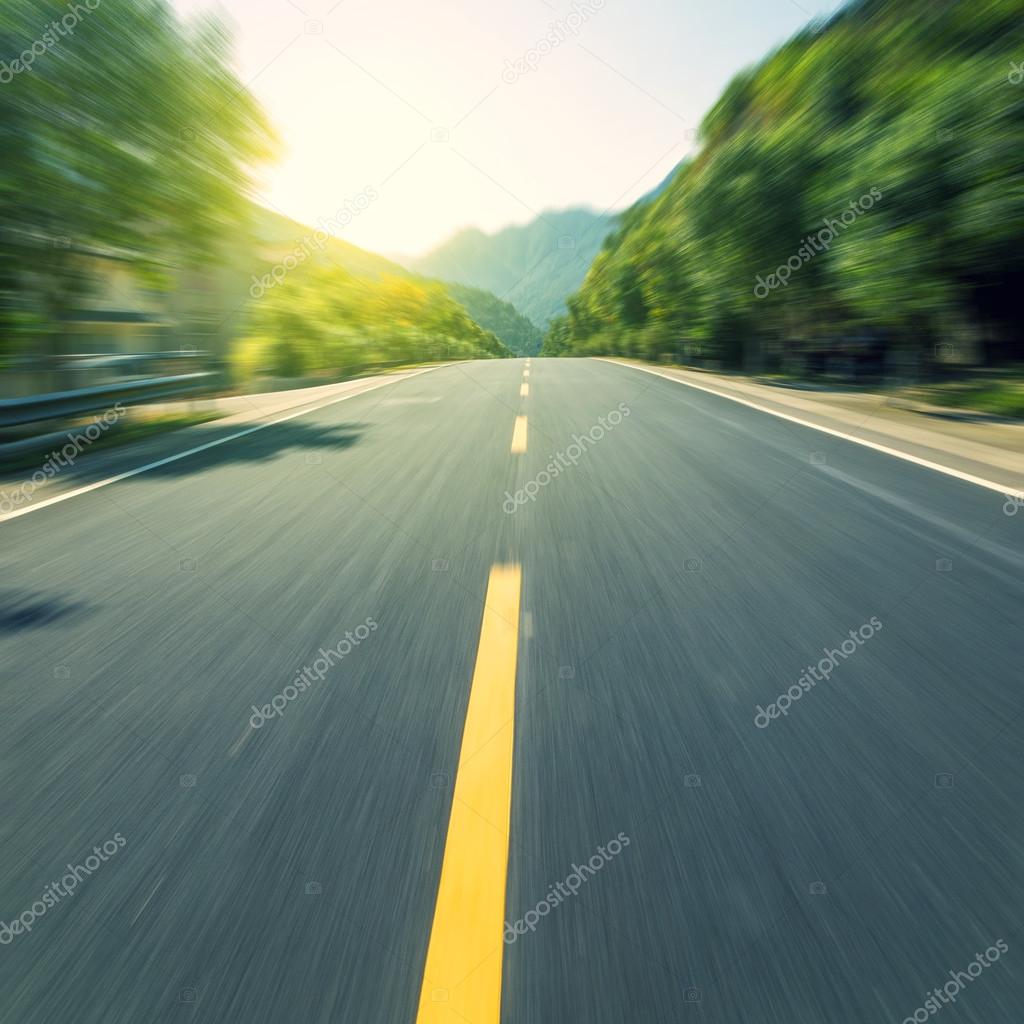 Highway winding road Stock Photo by ©liushengfilm 75394425