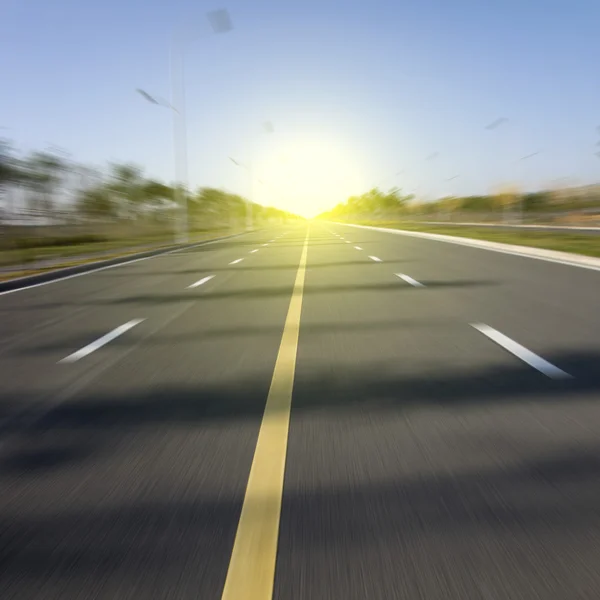 Highway winding road Stock Photo by ©liushengfilm 75394425
