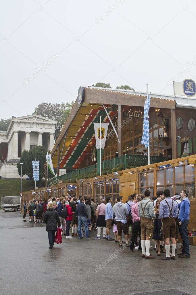 Queue in front of the beer tent — Stock Photo © Tinieder #78147848