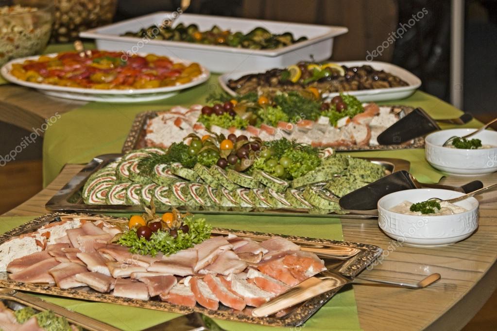 Cold buffet with various delicacies Stock Photo by ©Tinieder 98961128