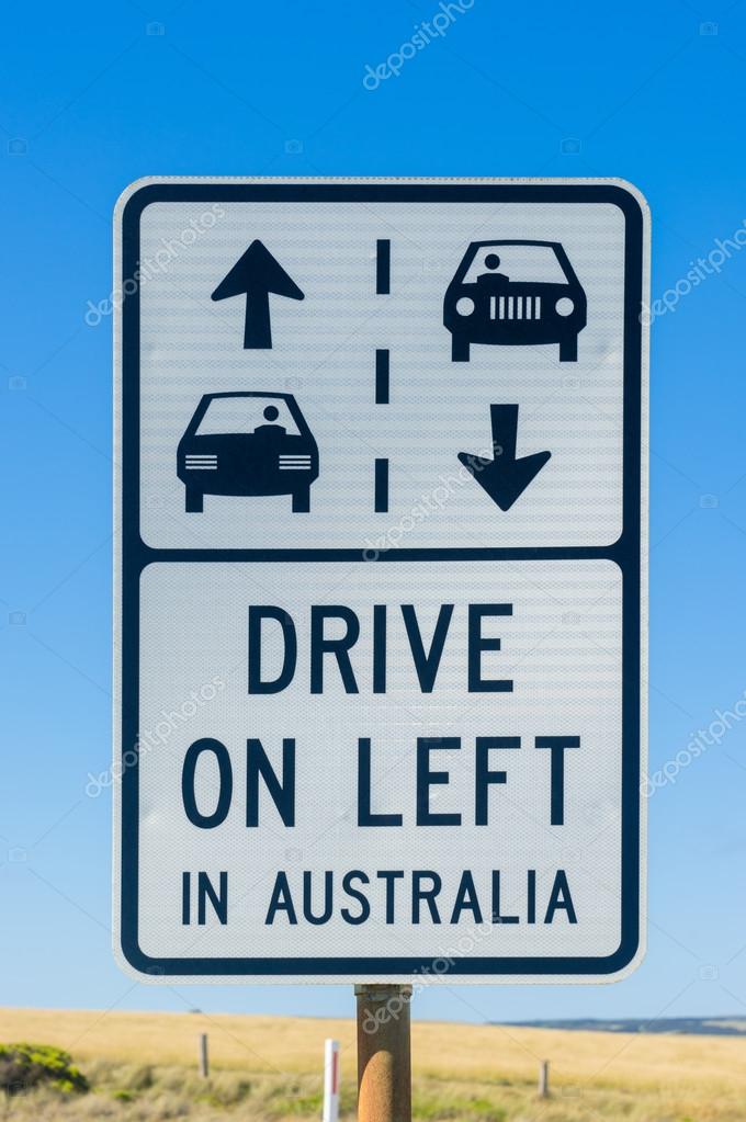 Australian road sign with arrows and drive on left message — Stock ...
