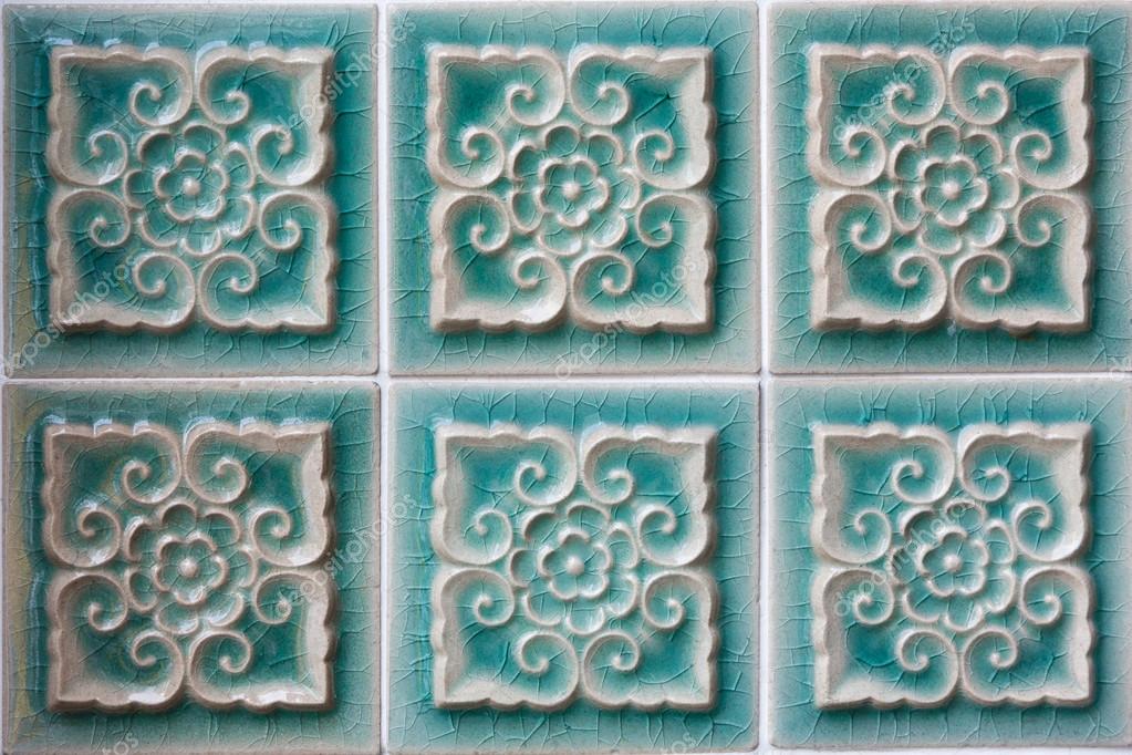 Decorating green ceramic wall tiles Stock Photo by ©8meg 93488920