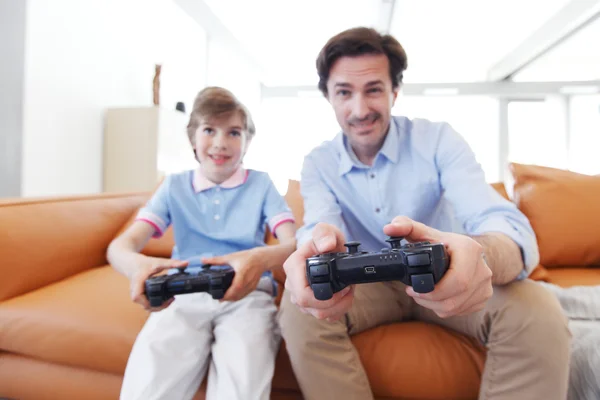 father and son play video game - Stock Image - Everypixel