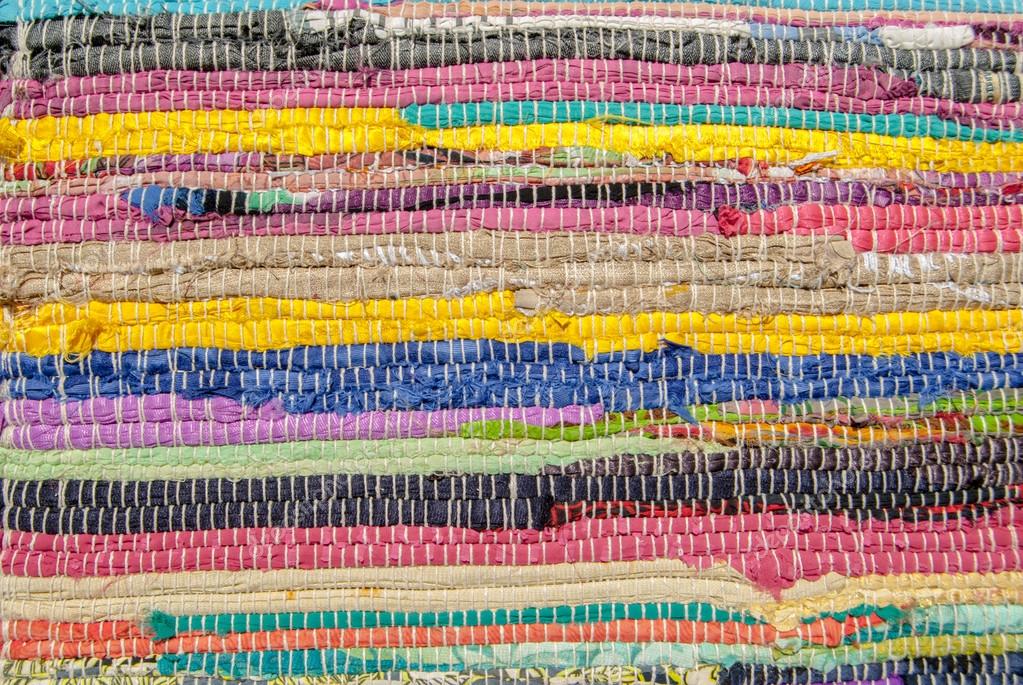 Colorful carpet texture, handmade carpet, close up of beautiful hand ...