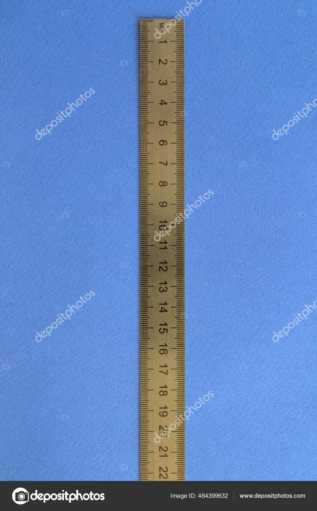 Metal Ruler Lies Vertically Blue Background — Stock Photo © Andrey5984 ...
