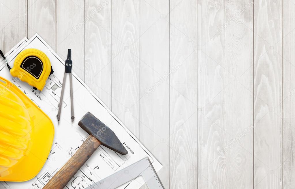 Construction tools prepared to build a house. Plan, helmet, hammer ...