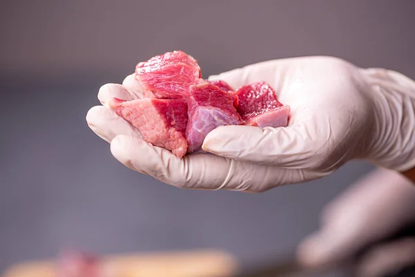 Meat Cutting Man Holding Raw Beef Cubes Wearing Glouse Grey — Stock ...
