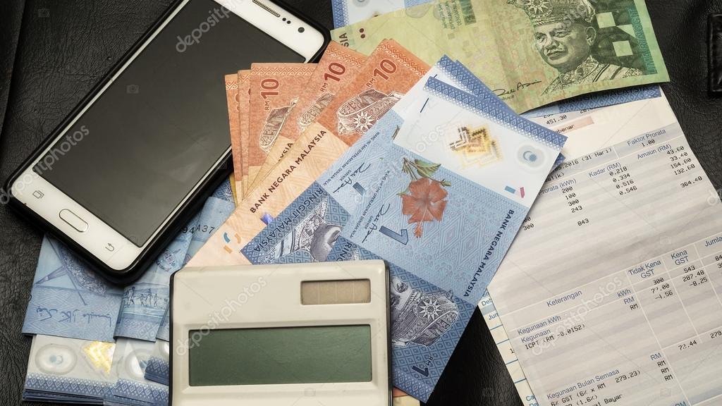 Malaysia ringgit cash and carculator-online business consept — Stock ...