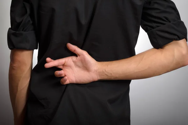 Fingers crossed behind back Stock Photos, Royalty Free Fingers crossed ...