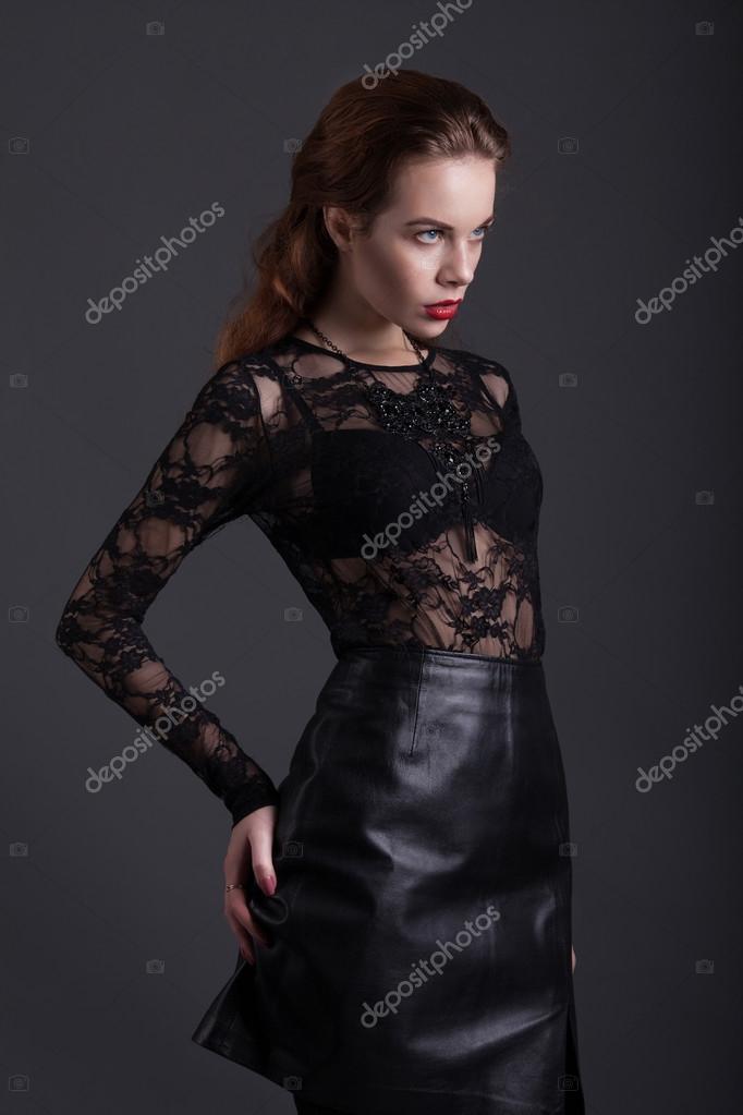 Fashion model on gray background Stock Photo by ©Lashkhidzetim 106189340