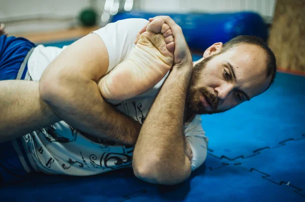 BJJ Jiu-jitsu brasileño combate terrestre entrenamiento combate moderado. Técnica de control de ...