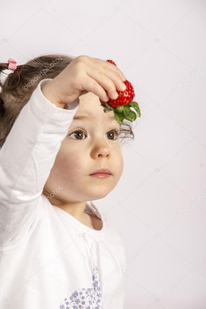 Baby less than two years eating strawberry — Stock Photo © andiphoto ...
