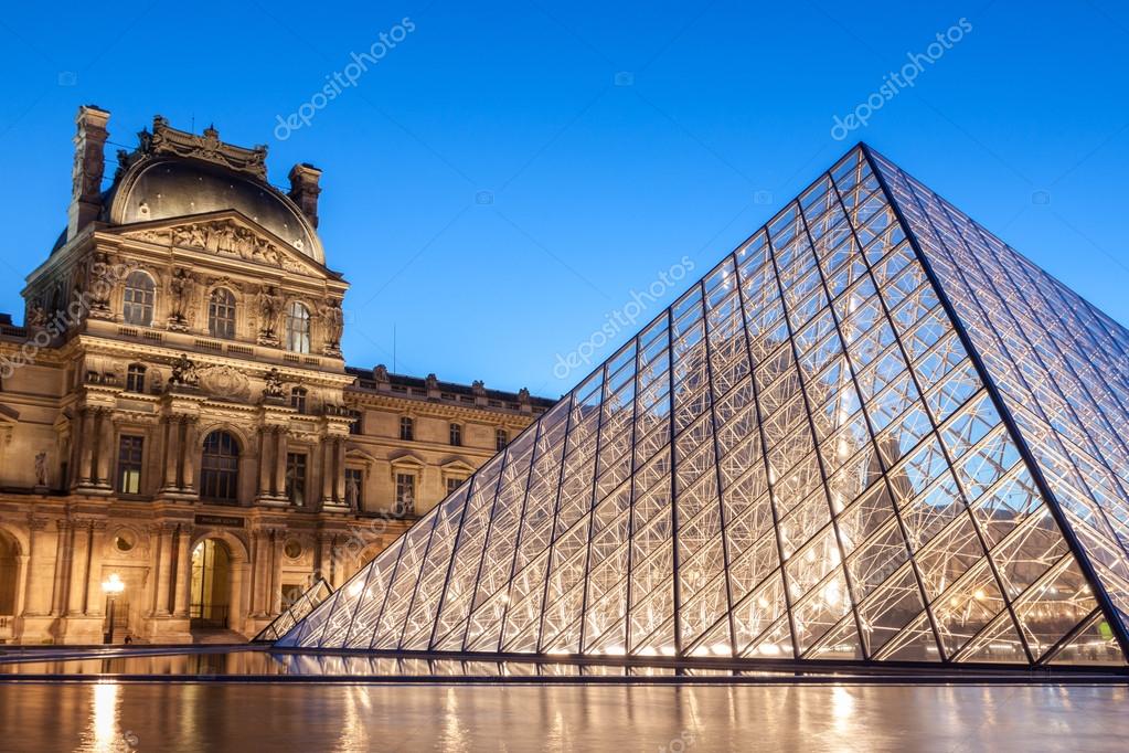 Louvre Museum at dusk in Paris – Stock Editorial Photo © bukki88 #73913055