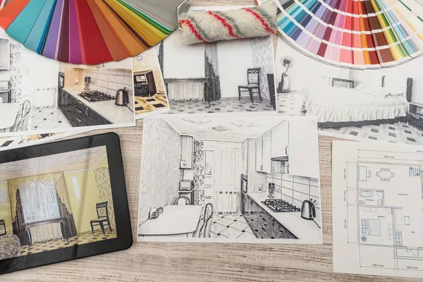 tablet showing bedroom plans in finished room. Modern apartment ...