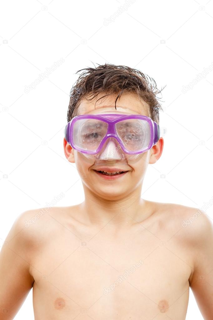 Boy diver in swimming mask with a happy face close-up portrait ...