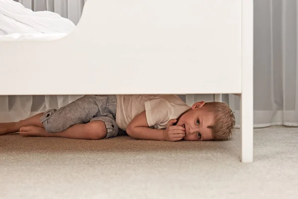 A child under the bed Stock Photos, Royalty Free A child under the bed ...