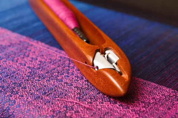 Weaving shuttle on the warp — Stock Photo © kozachenko #75188507