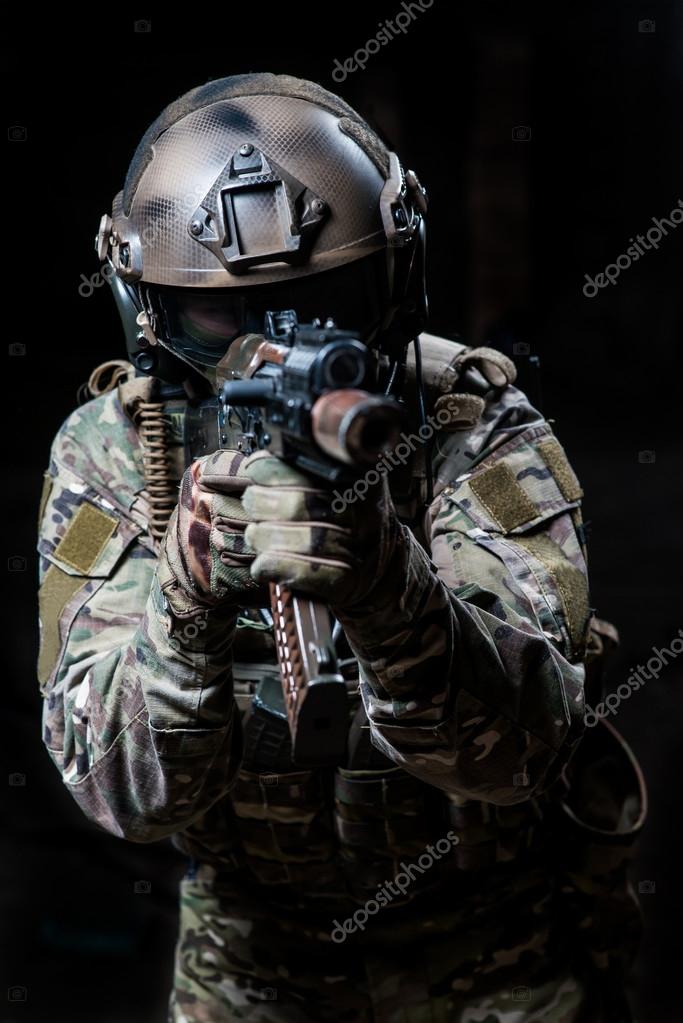 Russian army soldiers in a mask shoots a machine gun — Stock Photo ...