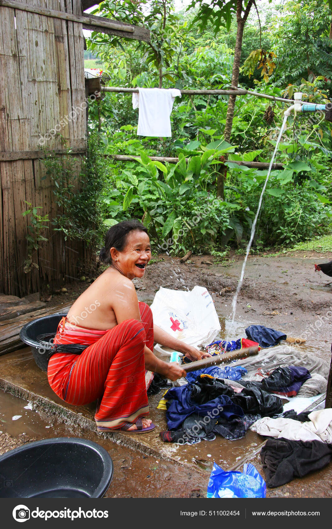 Washing Clothes At The River