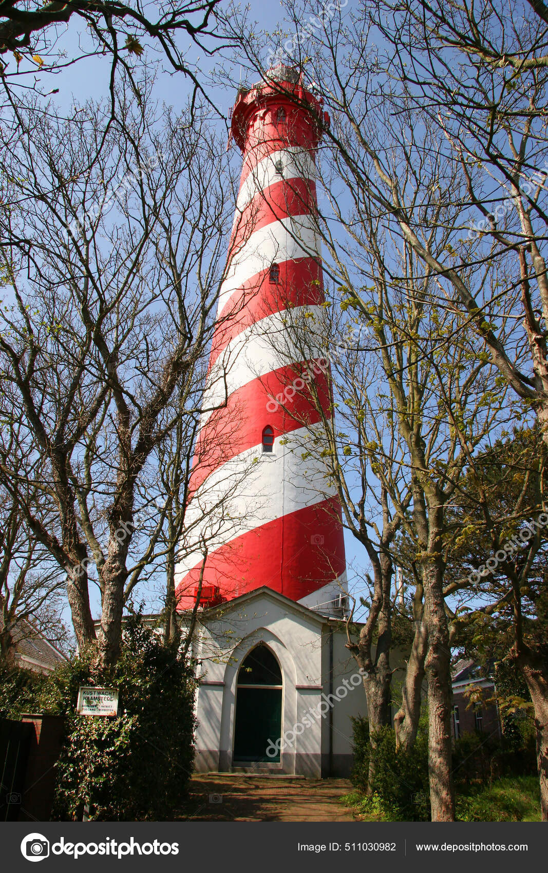 Red White Striped Lighthouse — Stock Photo © DirkM.deBoer #511030982