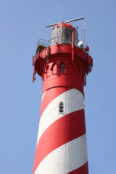 Red White Striped Lighthouse — Stock Photo © DirkM.deBoer #511069274