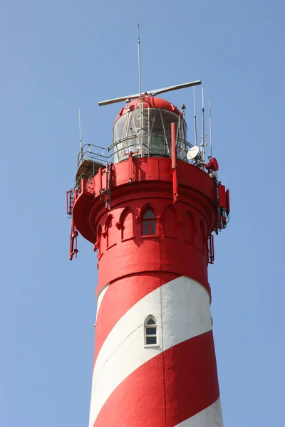Red White Striped Lighthouse — Stock Photo © DirkM.deBoer #511069274