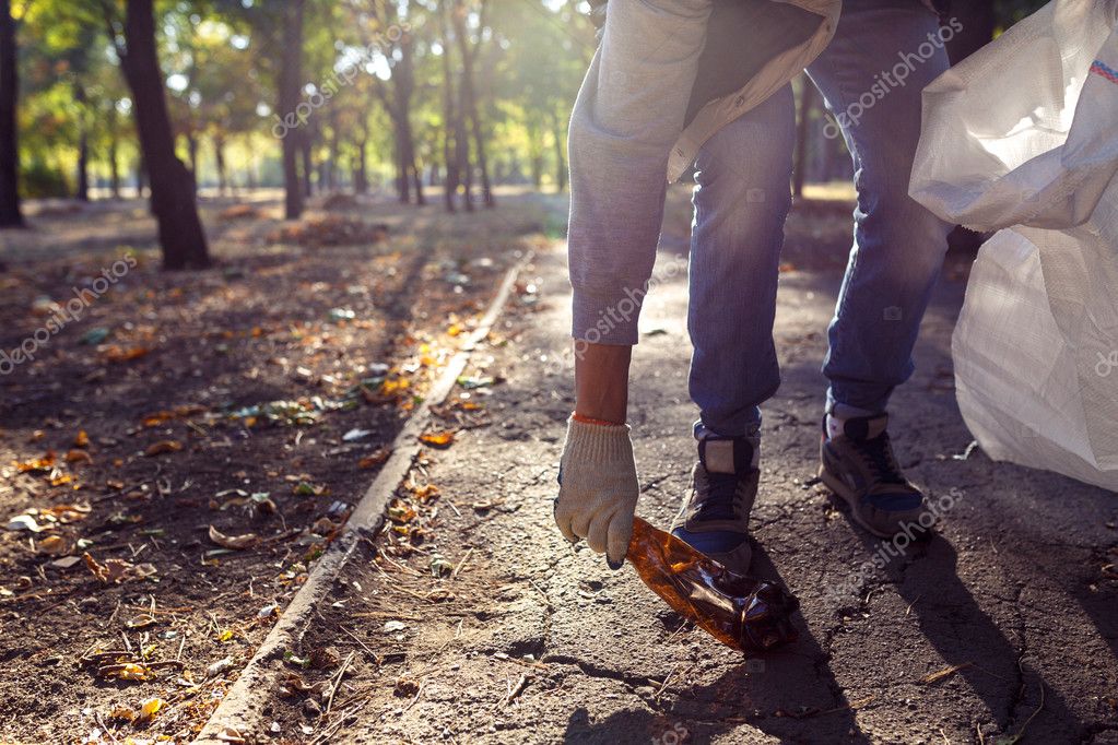 Man Picking Up Trash