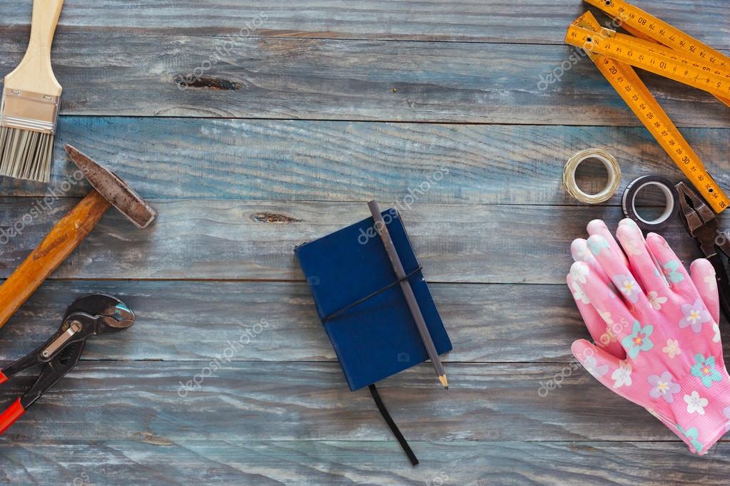 Book and notes on carpenter's table Stock Photo by ©Myvisuals 100265974