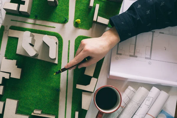 Top view of architect drawing on architectural project Stock Photo by ...