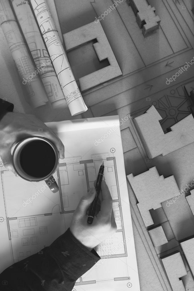 Top view of architect drawing on architectural project Stock Photo by ...