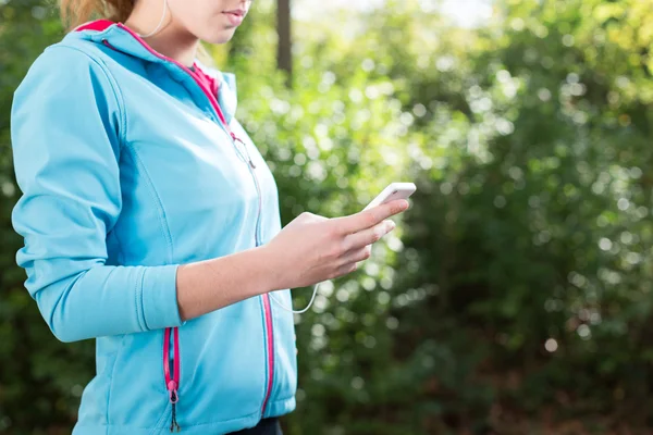 Running woman. Female runner relaxing after jogging outdoor work ...