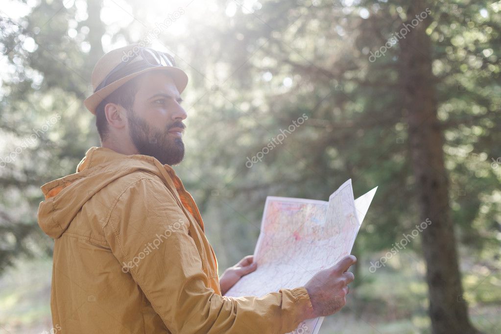 Hombre con un mapa en las manos: fotografía de stock © Myvisuals ...