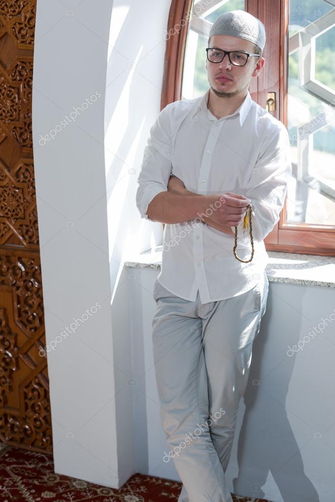 Muslim Man Attending Mosque — Stock Photo © Myvisuals #118353812