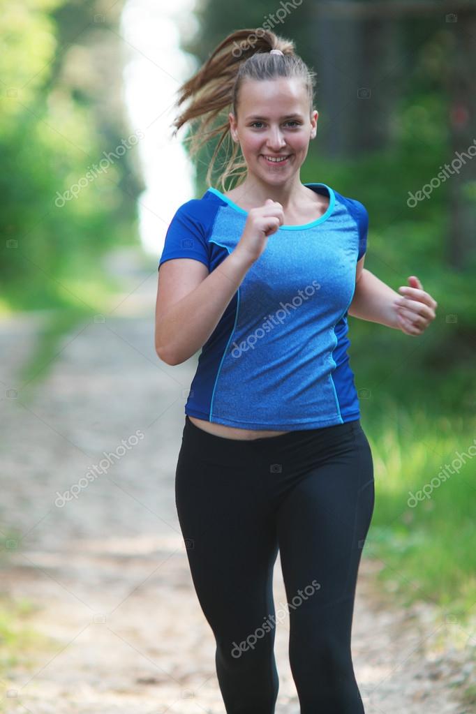 Running healthy fitness woman training for marathon outdoors in — Stock ...