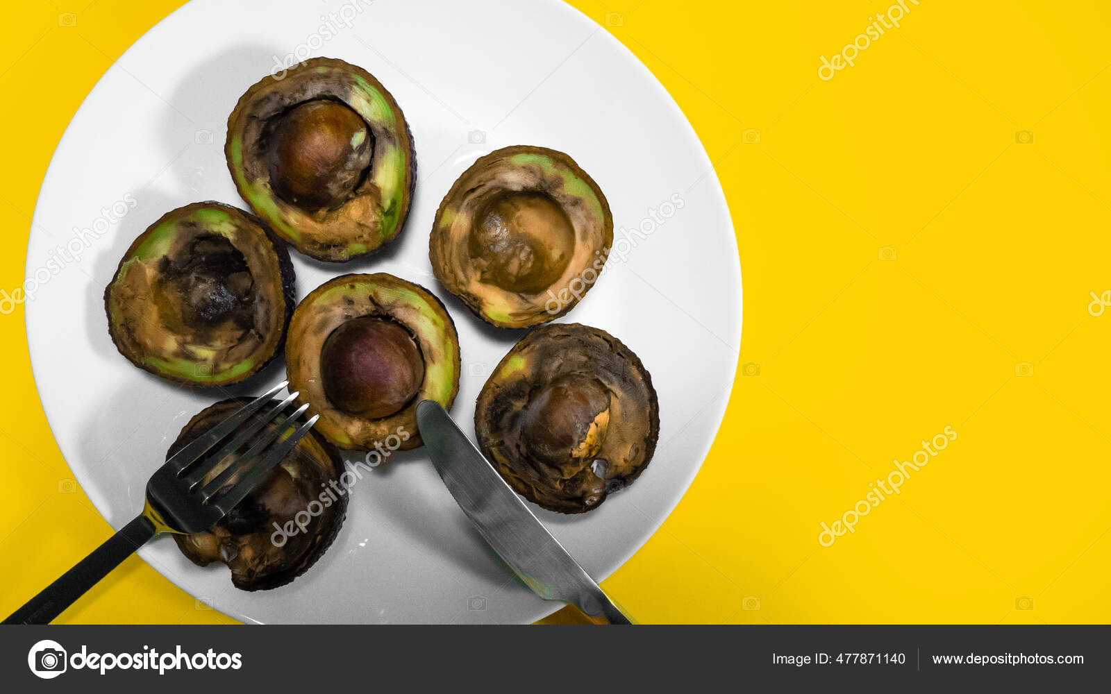 Bad Avocado Halfs Placed Plate Fork Knife Yellow Background Rotten ...
