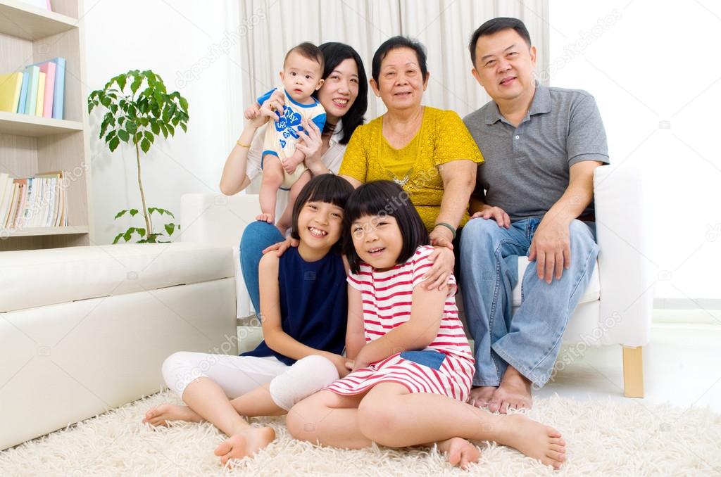 Happy Asian family Stock Photo by ©yongtick 97190896