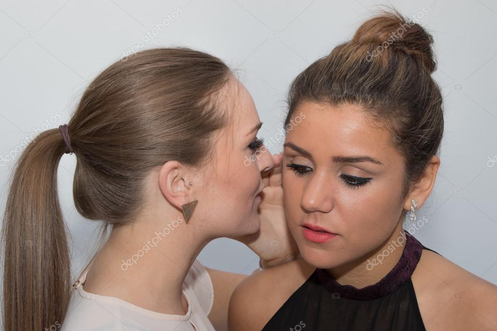 Dos chicas compartiendo un secreto: fotografía de stock © PeterRalph ...