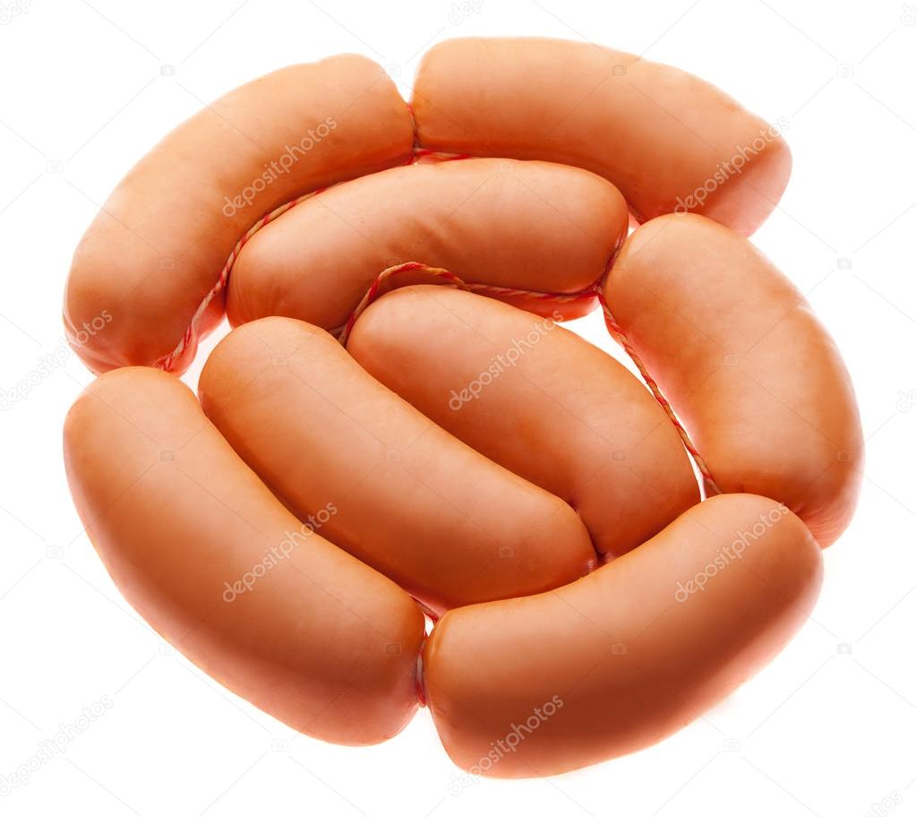 Sausages stacked in a circle on a white background Stock Photo by ...