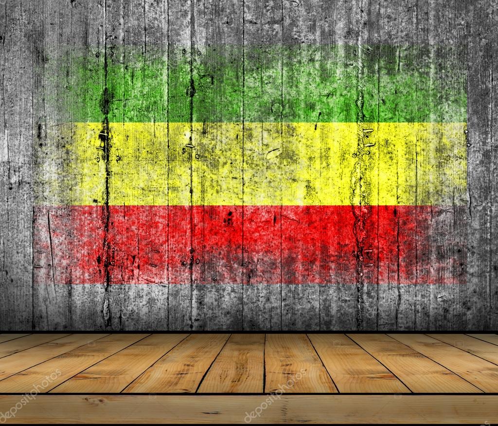 Rasta flag painted on background texture gray concrete with wooden ...