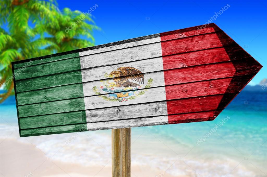 Mexico Flag wooden sign on beach background — Stock Photo © Bennian ...