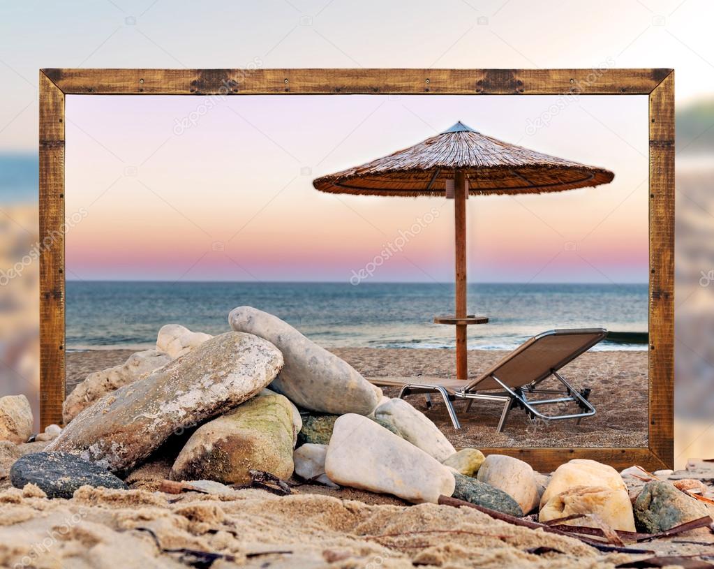 Rock on the beach with beautiful beach picture frame and blurred beach ...