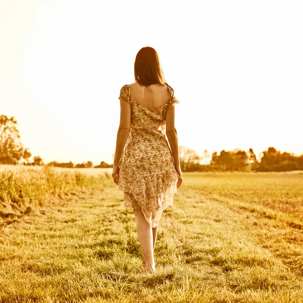 Woman walking away - Stock Image - Everypixel