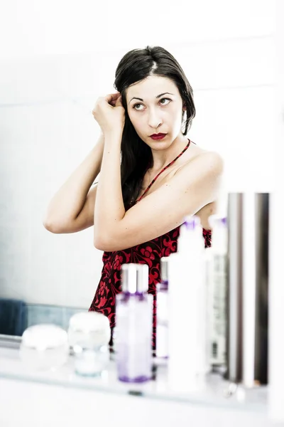 Natural Beauty styling her Hair - Stock Image - Everypixel