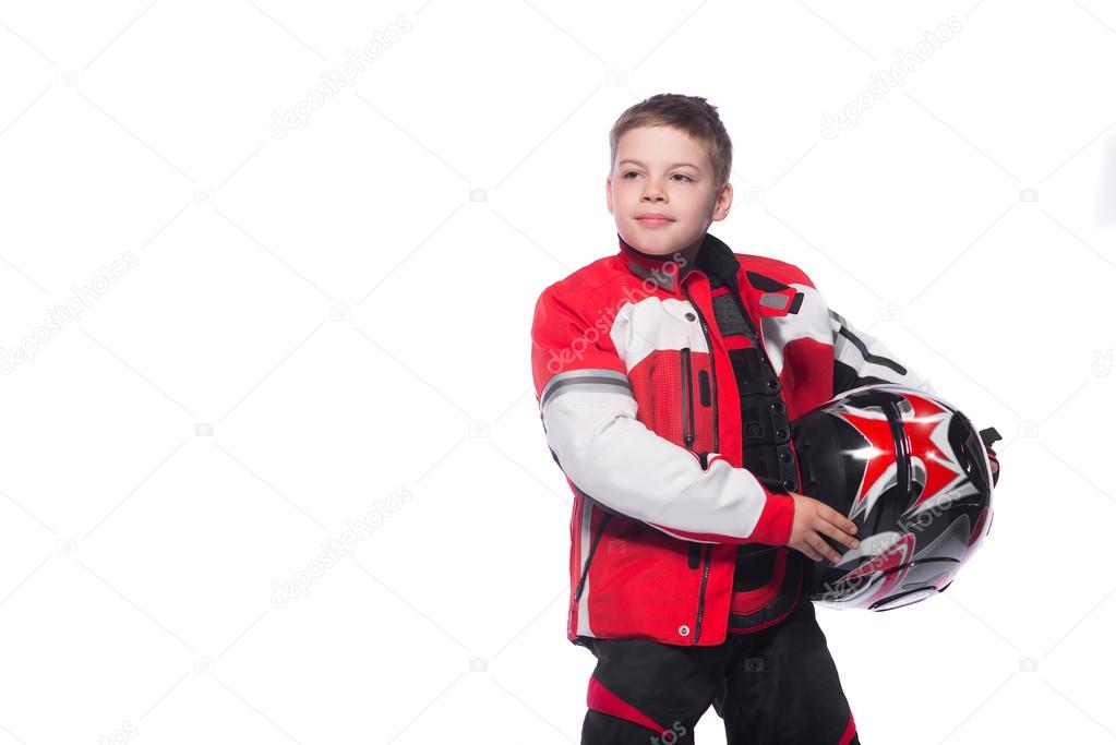 Race car or bike driver. The boy in the costume of the racer isolated ...